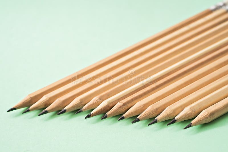 Many Pencils on Green Table Stock Photo - Image of yellow, copy: 75887478