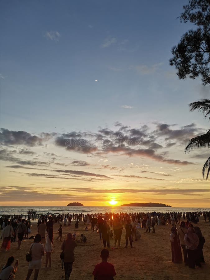 Many People Waiting for Sunset at the Beach Stock Photo - Image of ...