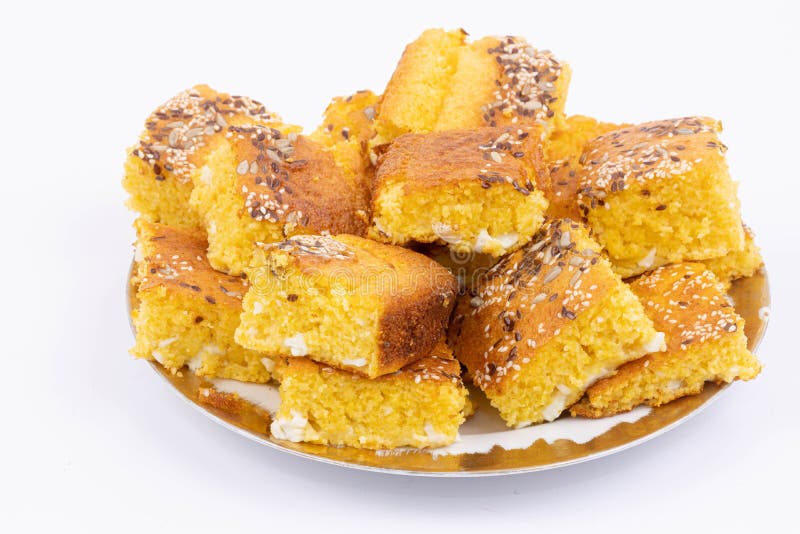 Many Pieces of Cornbread Served on a Plate Isolated on an Empty White ...