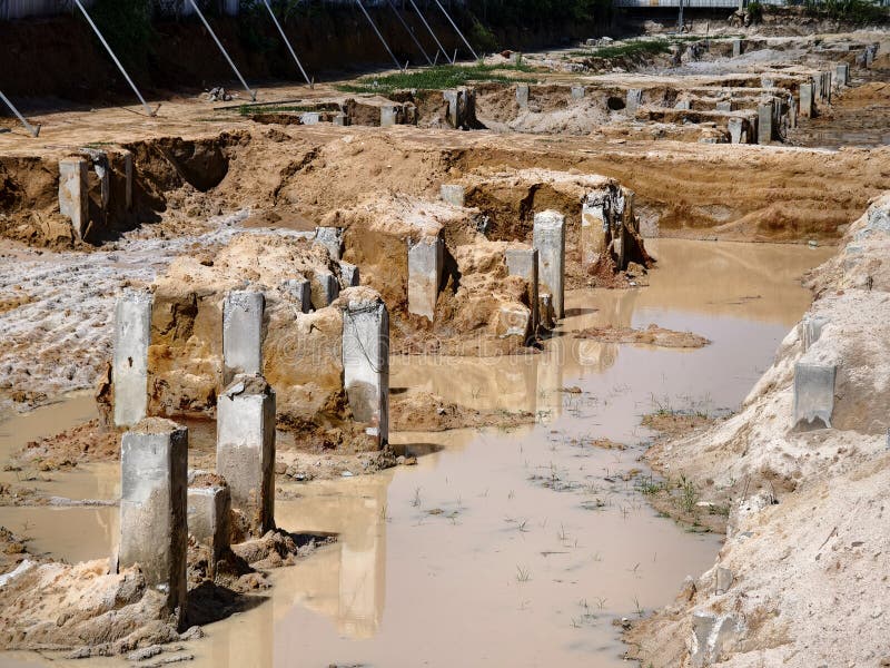 Many Piles in the Middle of a Construction Site Stock Photo - Image of ...