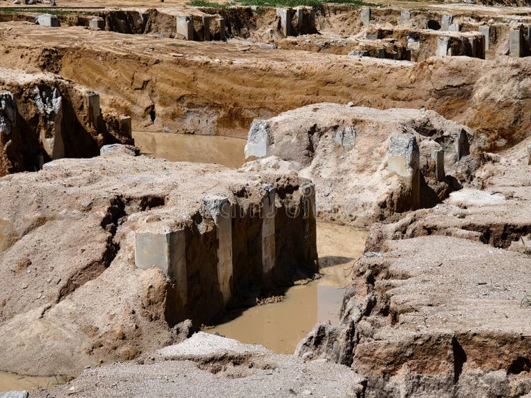 Many Piles in the Middle of a Construction Site Stock Photo - Image of ...