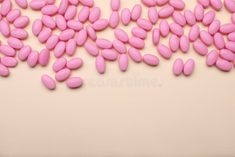 Many Pink Dragee Candies Yellow Background Flat Lay Space Text Stock ...