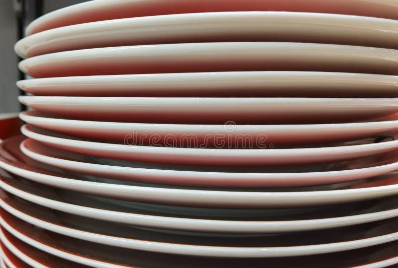 Many Plates that are Placed on Top of One Another Give an Interesting ...