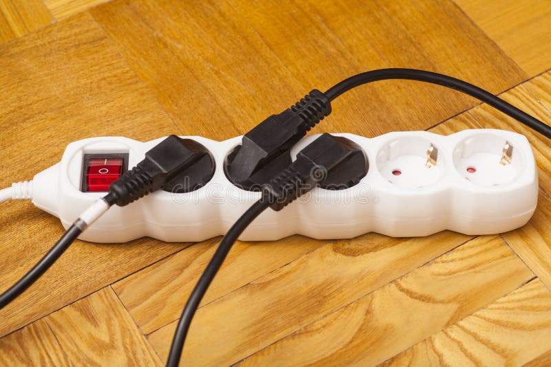 Many Plugs Plugged into Electric Power Bar Stock Photo - Image of ...