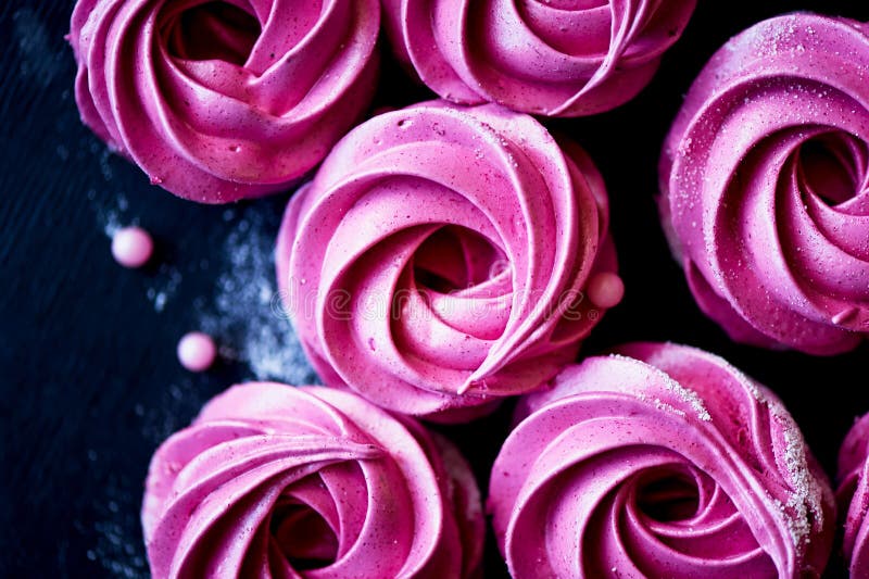 Many Purple Marshmallow on a Dark Surface. a Contrasting Picture. a ...