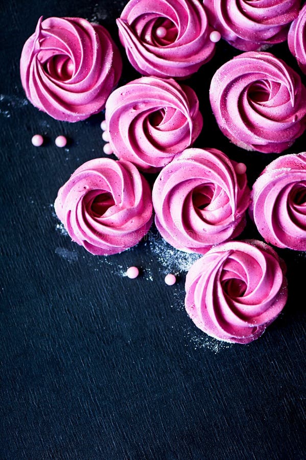 Many Purple Marshmallow on a Dark Surface. a Contrasting Picture. a ...