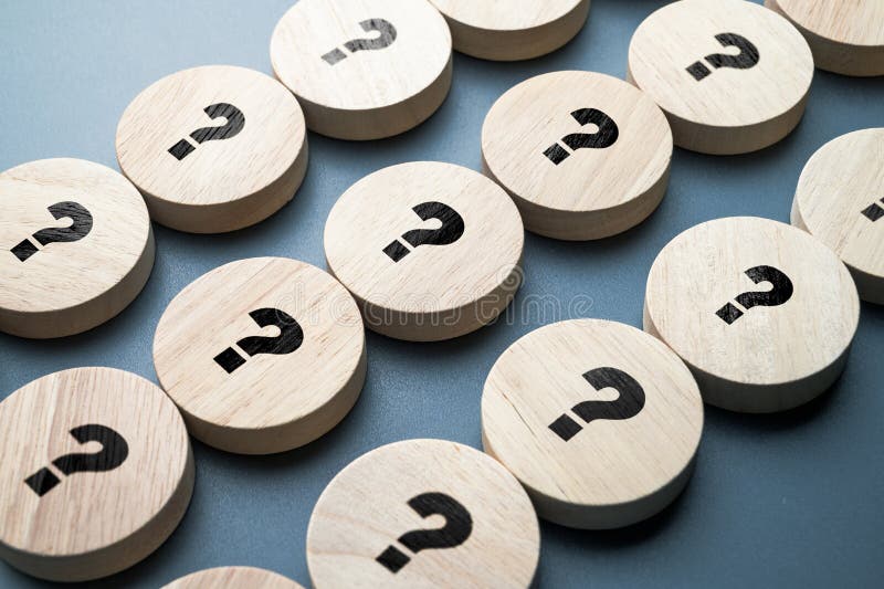 Many Question Marks on Round Wood Blocks Arranged in the Rows, Many ... Many Question Marks on Round Wood Blocks Arranged in the Rows, Many ...