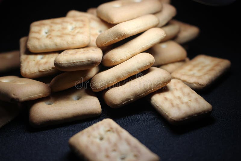 Many Rectangular Biscuits with Small Pores on Black Floor Stock Image ...