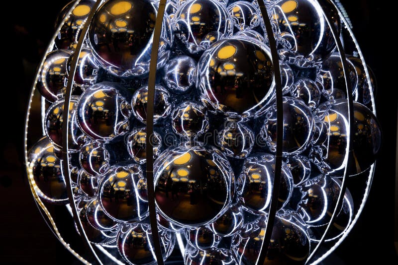 Blue Mirrored Glass Spheres with Rain Drops Shining in Night Lights ...