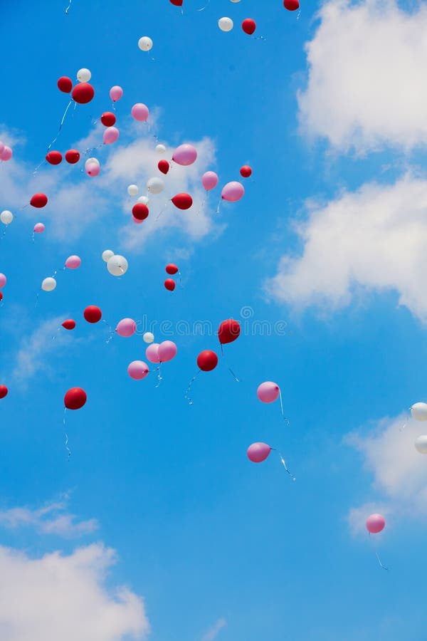 Many Released Flying Balloons in Blue Sky Stock Photo - Image of ...