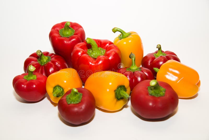 Many Ripe Red and Yellow Peppers on Over White Stock Image - Image of ...