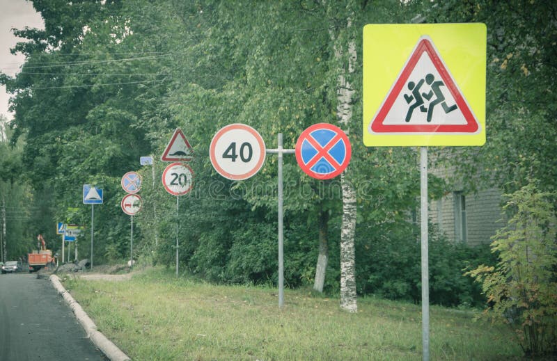 Too Many Signs To Be Aware Of On The Roadway And Moving Fast Car. Stock ...