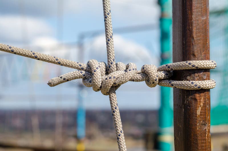 Many Ropes and One Big Knot Close Up Stock Photo - Image of joining ...