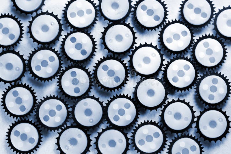 Many Round Cogged Wheels with Sharp Cogs Stock Image - Image of ...