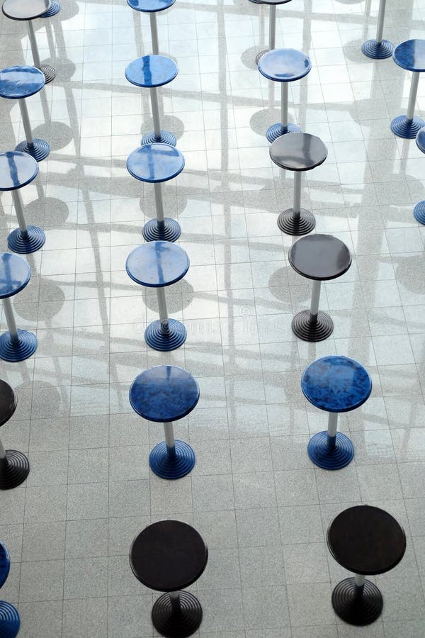 Many Round Eating Tables in Empty Cafe Hall Vertical View Abstract ...