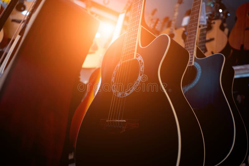 Many Rows of Classical Guitars in the Music Shop Stock Photo - Image of ...