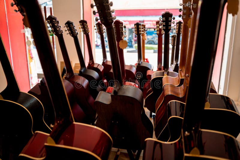 Many Rows of Classical Guitars in the Music Shop Stock Photo - Image of ...