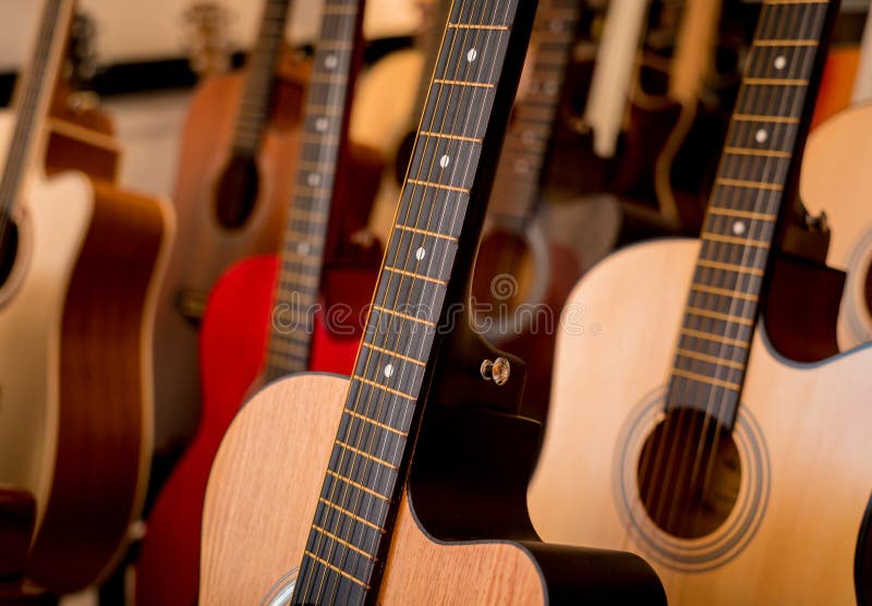 Many Rows of Classical Guitars in the Music Shop Stock Photo - Image of ...