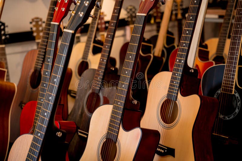 Many Rows of Classical Guitars in the Music Shop Stock Photo - Image of ...