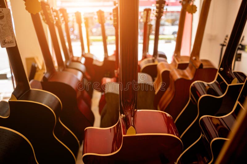 Many Rows of Classical Guitars in the Music Shop Stock Photo - Image of ...