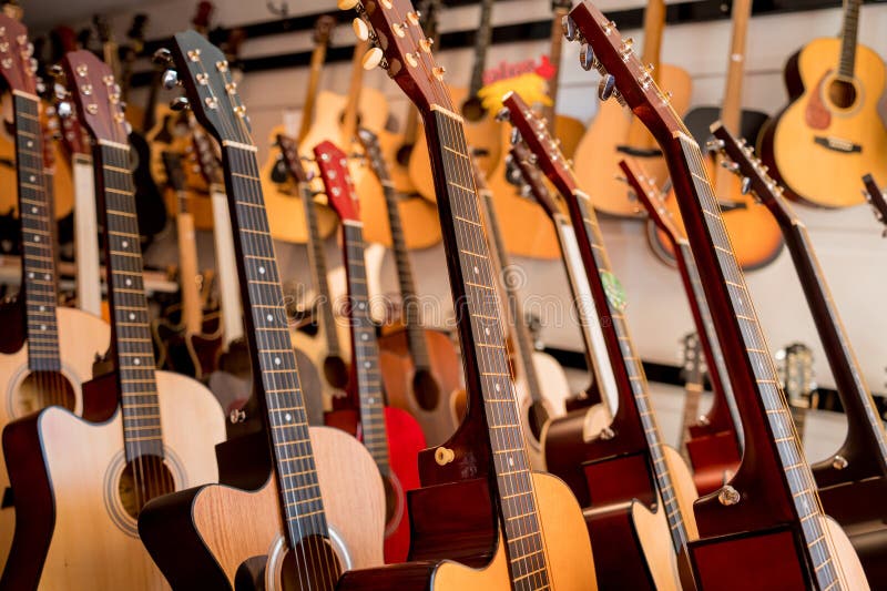 Many Rows of Classical Guitars in the Music Shop Stock Photo - Image of ...