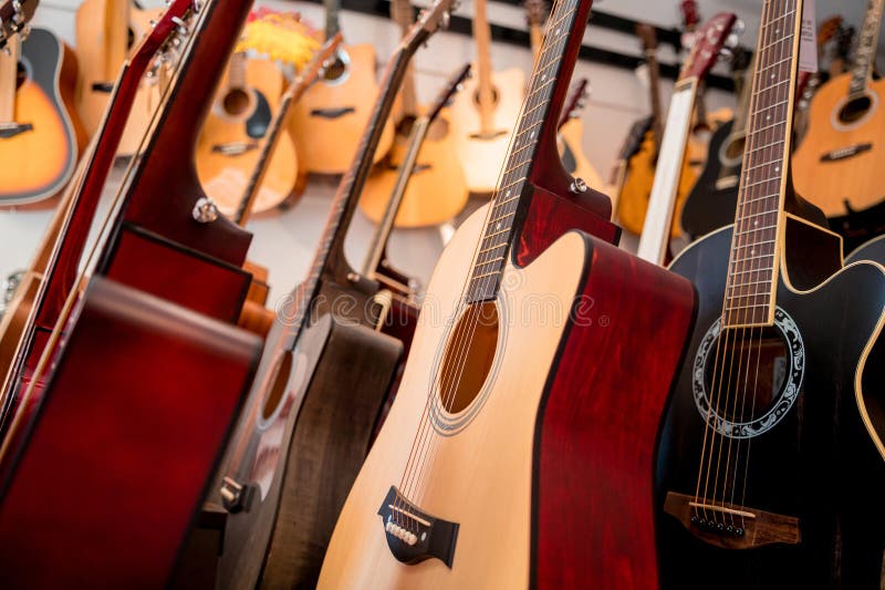 Many Rows of Classical Guitars in the Music Shop Stock Photo - Image of ...