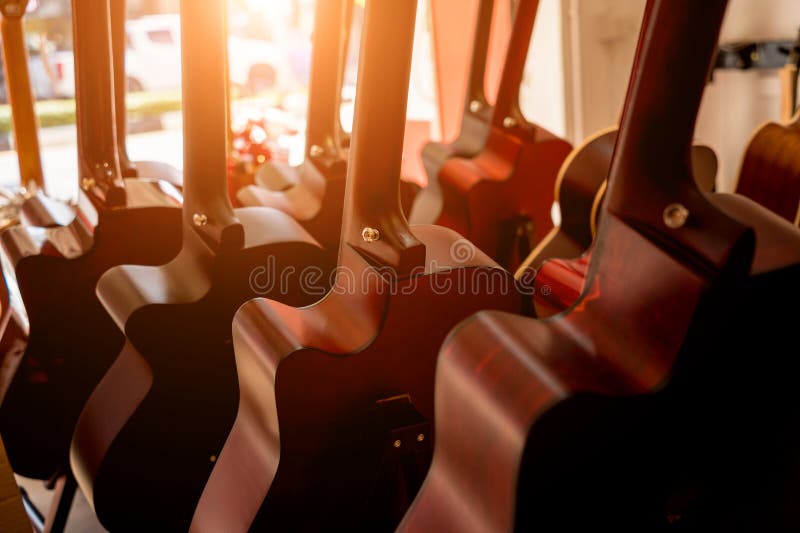 Many Rows of Classical Guitars in the Music Shop Stock Photo - Image of ...