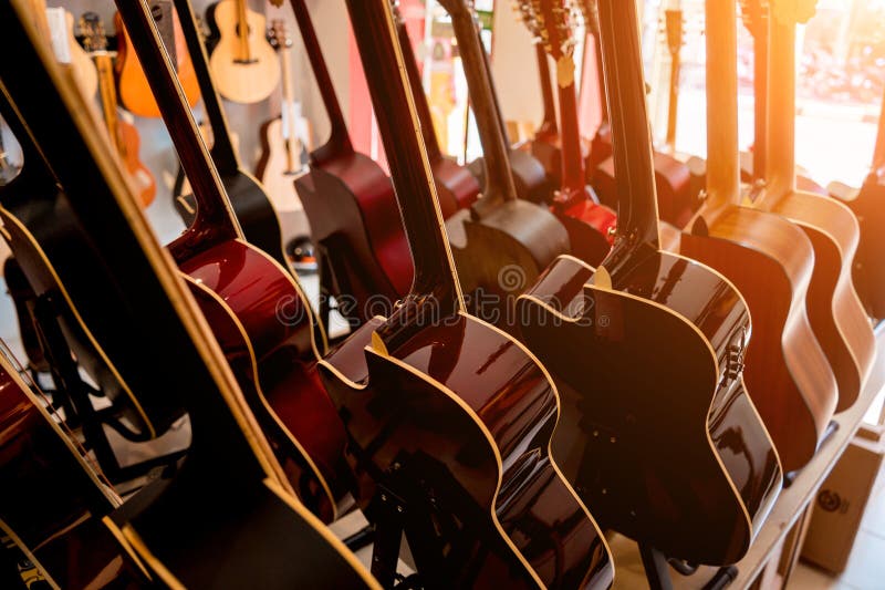 Many Rows of Classical Guitars in the Music Shop Stock Image - Image of ...