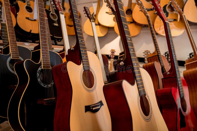 Many Rows of Classical Guitars in the Music Shop Stock Photo - Image of ...