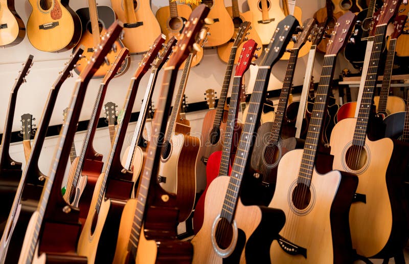 Many Rows of Classical Guitars in the Music Shop Stock Photo - Image of ...