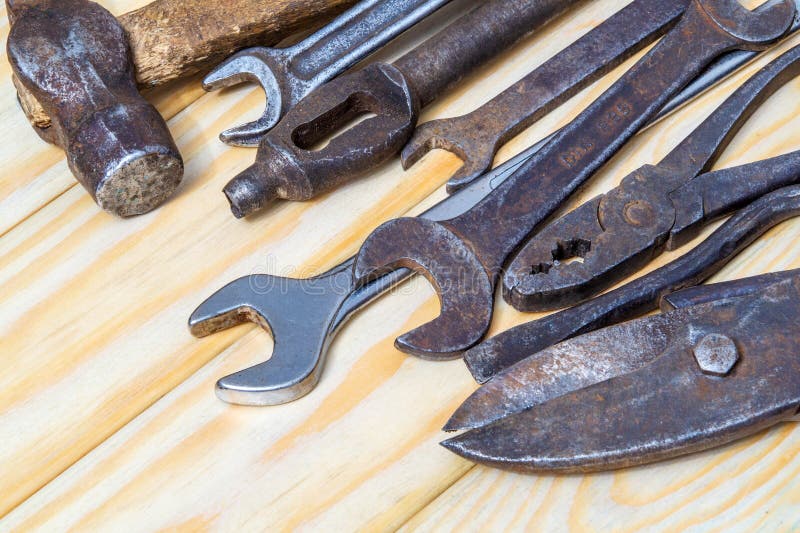 Old Tools Stacked after Work on Vintage Wood Background Stock Image ...