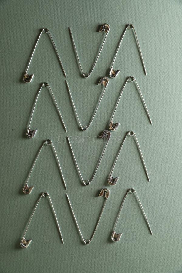 Many Safety Pins on Green Background, Flat Lay Stock Photo - Image of ...