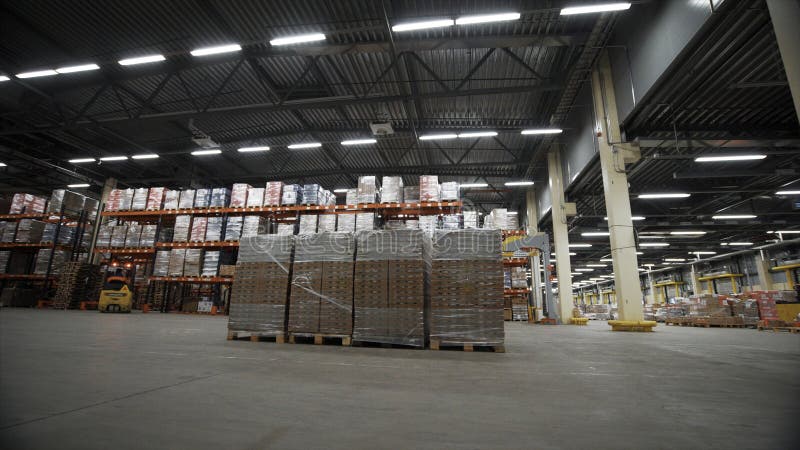 Many Shelves of Cardboard Boxes Inside a Storage Warehouse. Creative ...