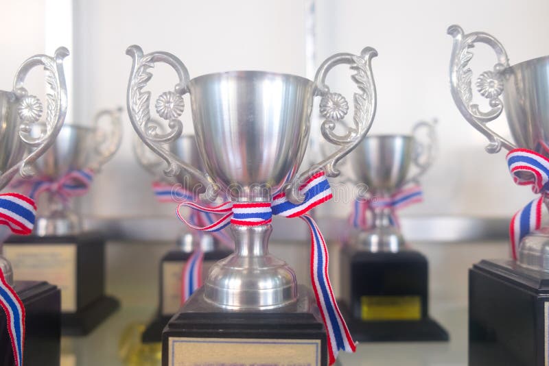 Many shiny silver trophies stock photo. Image of championship - 70864194