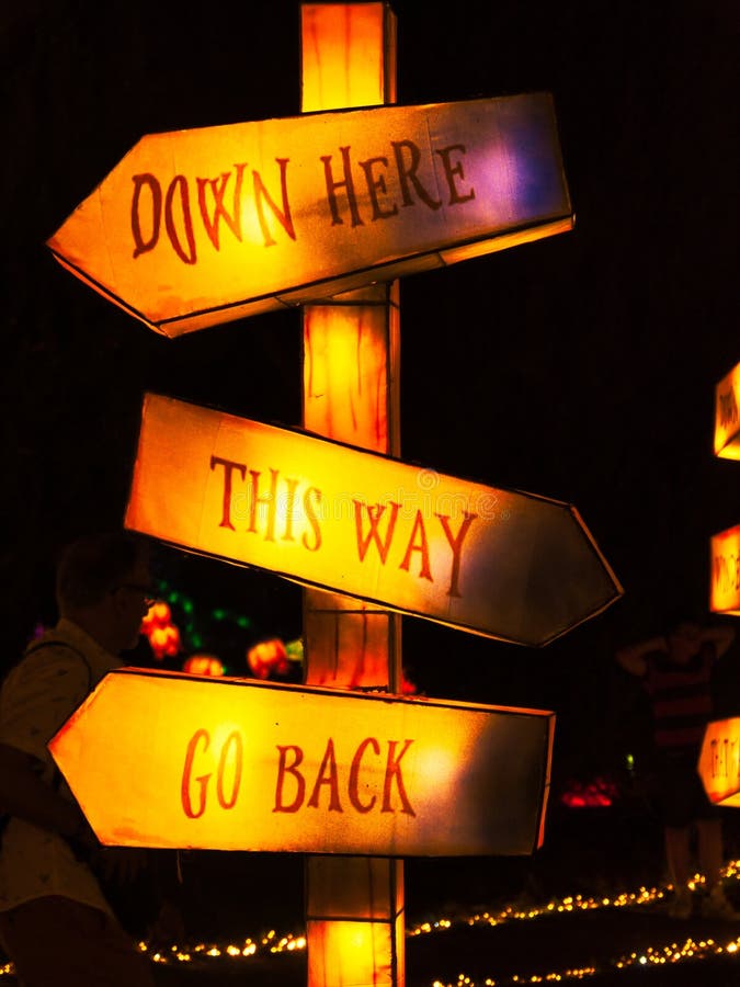 Many Signs in Wonderland at Night Stock Photo - Image of snowfall ...