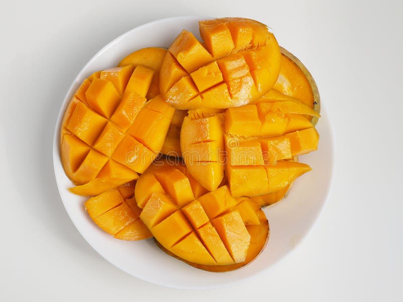 Many Sliced Mango Fruit on Plate. Stock Photo - Image of yellow, fruit ...