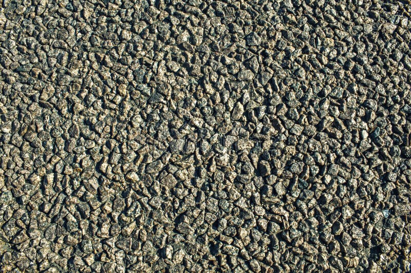 Many Small Stones in a Row. Stock Image - Image of dark, small: 128354721