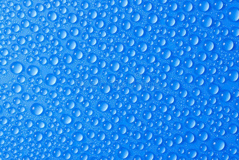 Small Water Drops on a Blue Surface Stock Photo - Image of flat, water ...