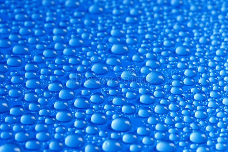 Small Water Drops on a Blue Surface Stock Photo - Image of concept ...