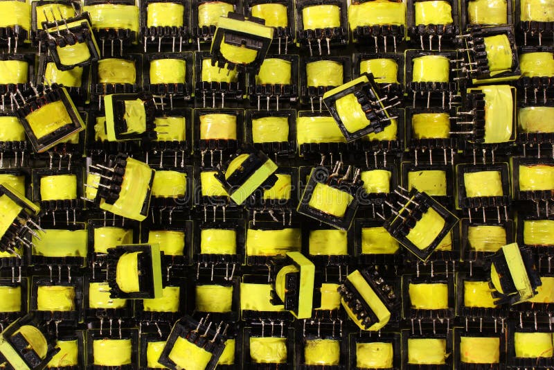 Many Small Yellow Electrical Ferrite Transformers Stock Image - Image ...