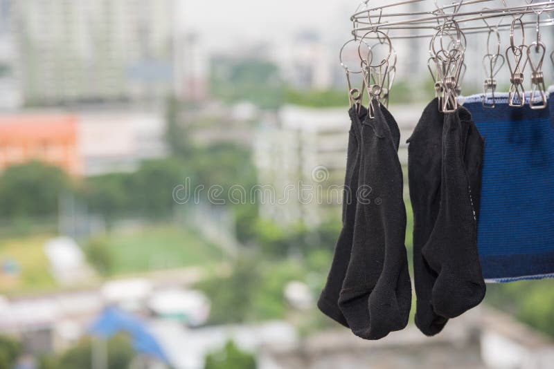 Many Socks Drying on Clothesline Stock Photo - Image of dryer, clothing ...