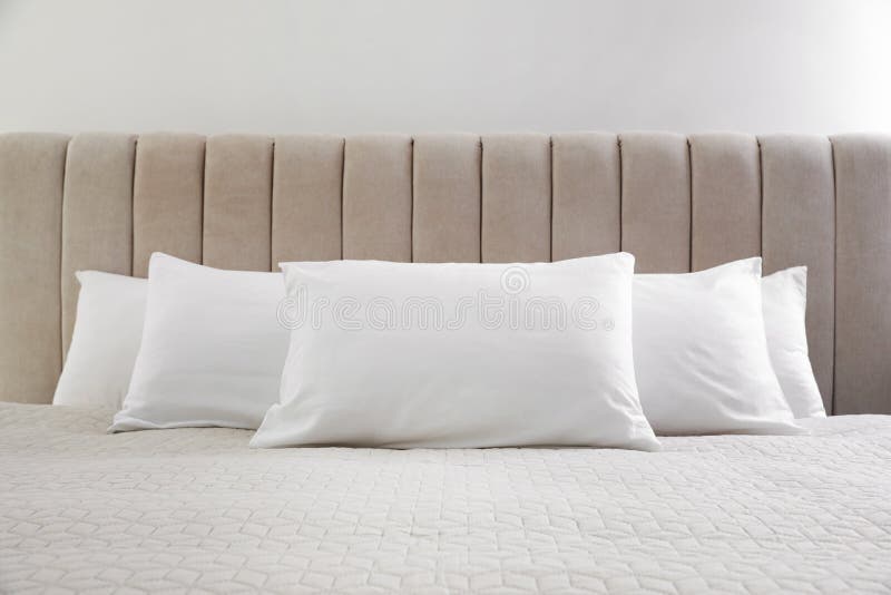 Many Soft Pillows on Large Comfortable Bed Stock Image - Image of ...