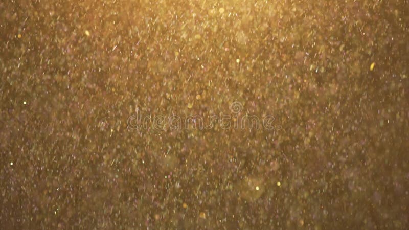Many Sparkling Glitters Showering Floating in Light on Empty Golden ...