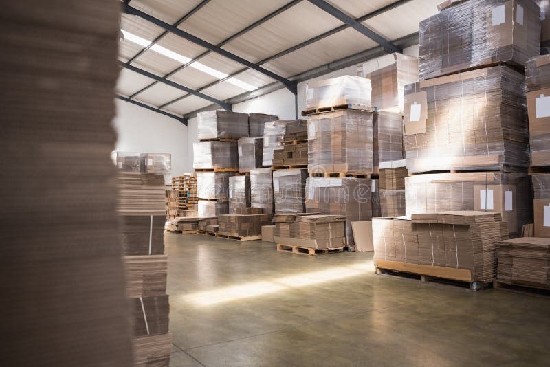 Cardboard Boxes In Warehouse Stock Photo - Image of supply, delivery ...