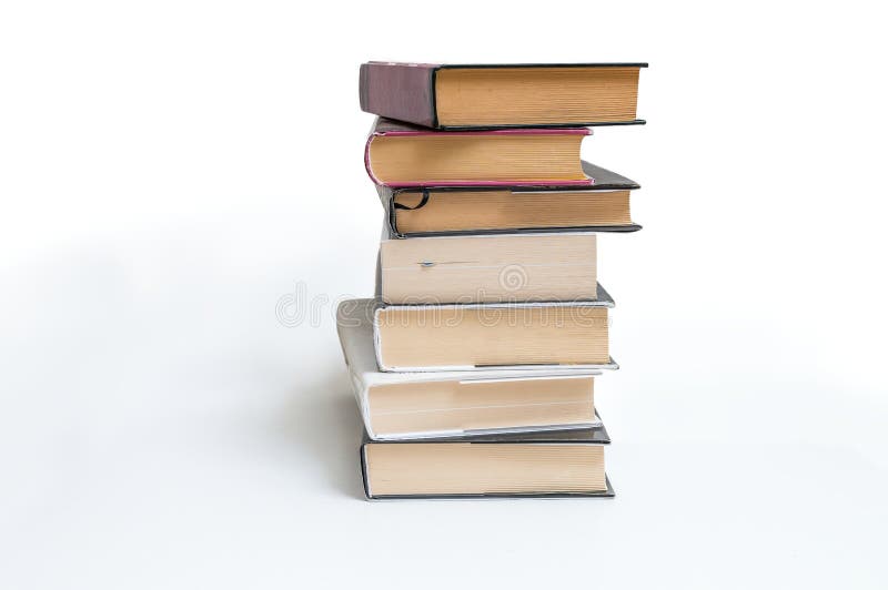 Stacked Books on a Beige Background. Stock Image - Image of ...