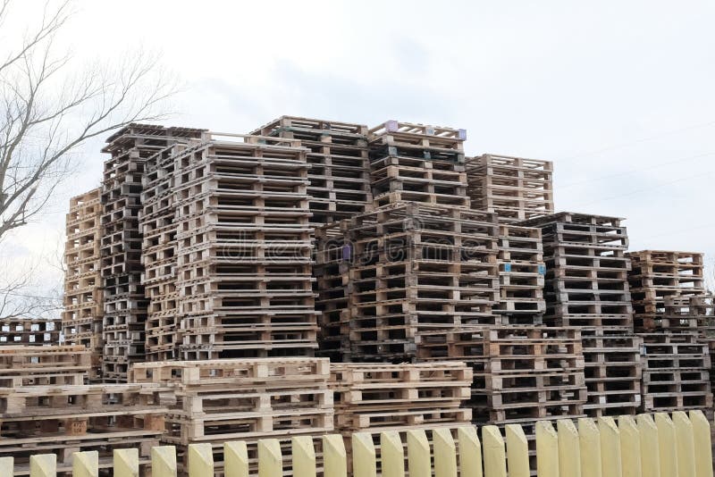Many stacked pallets stock photo. Image of pallet, stack - 109761084