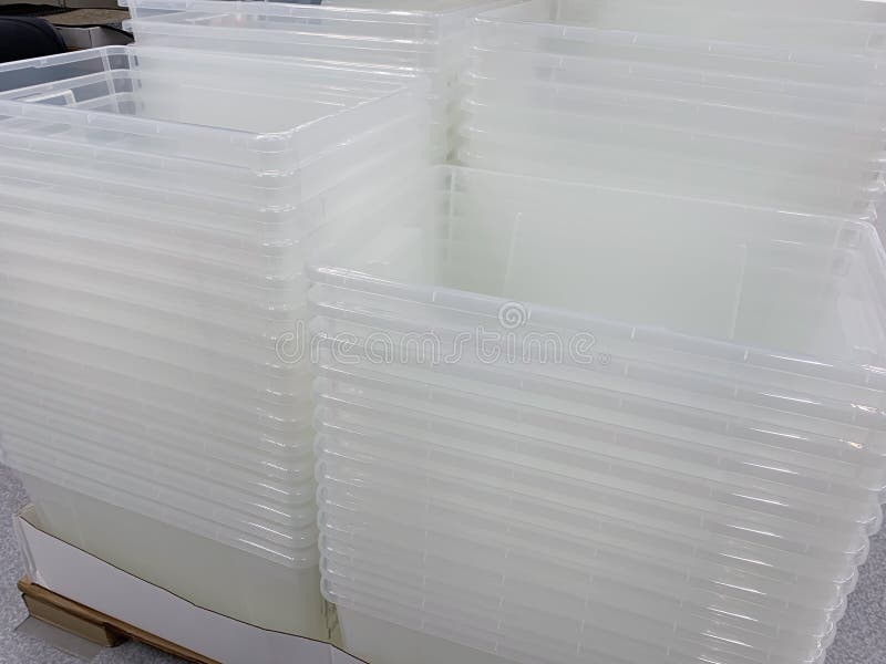 Many Stacked Transparent Plastic Containers for Storage Things at Home ...