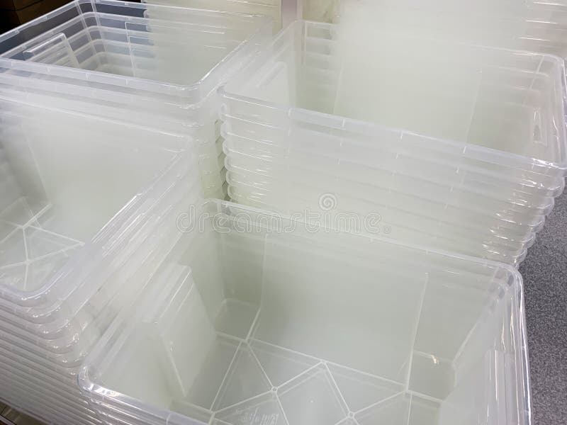 Many Stacked Transparent Plastic Containers for Storage Things at Home ...