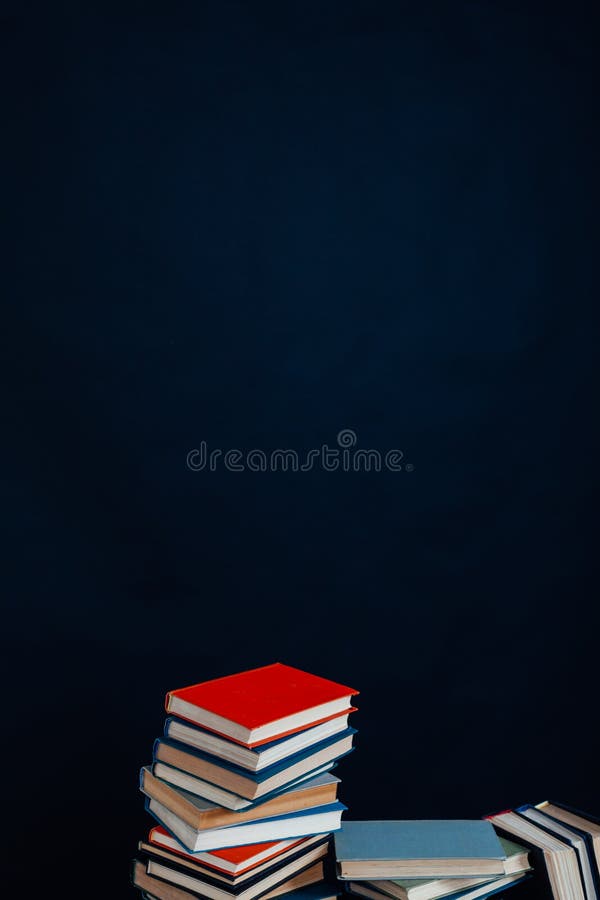 Many Stacks of Educational Books in the University Library on a Black ...