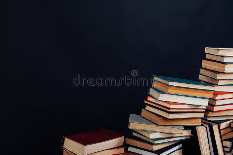 Many Stacks Of Educational Books In The University Library On A Black ...